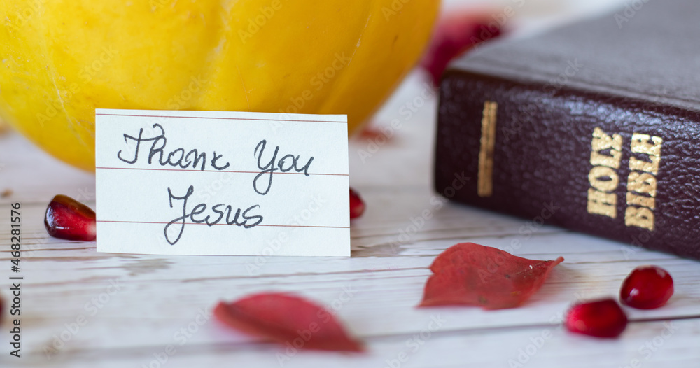 Thank You Jesus handwritten note with Holy Bible Book on white table ...