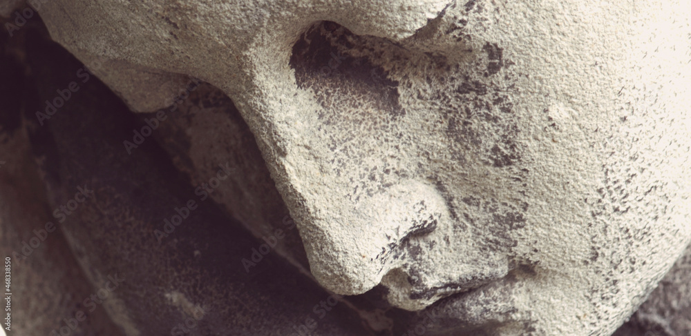 the suffering of the Virgin Mary. Fragment of ancient statue ...