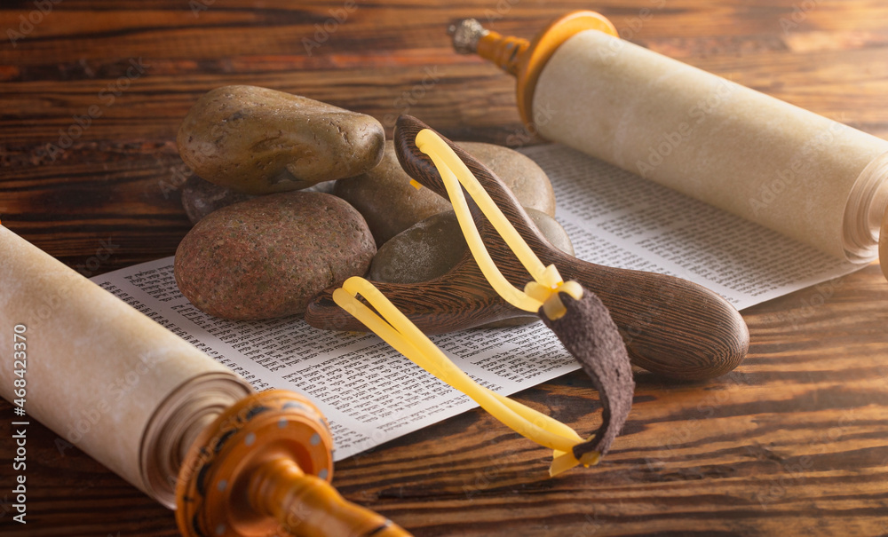 Five Smooth Stones and Sling Shot on a Hebrew Scroll Symbolising the ...