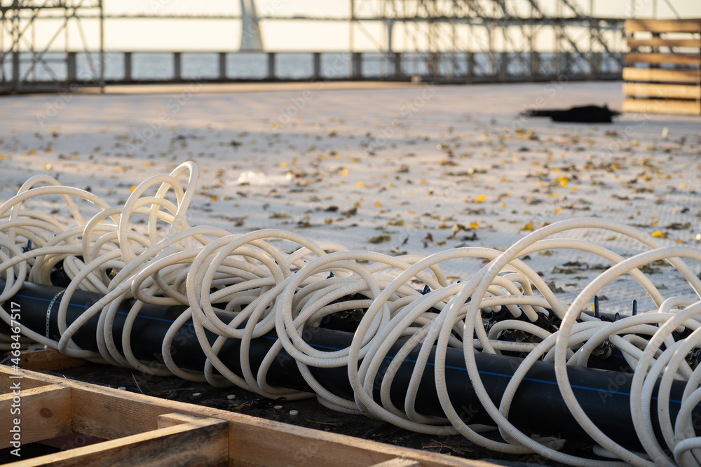 Building of outdoor ice rink: modern skating rink piping system with ...
