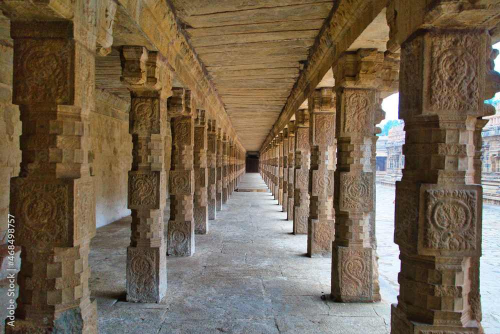 Ancient and simple carved stone pillars. Airavateswara temple. One of ...