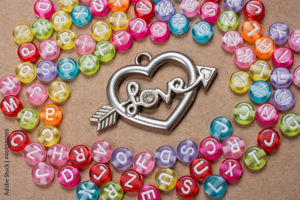 Heart shape and love wording amid colorful abc letters Stock Photo ...