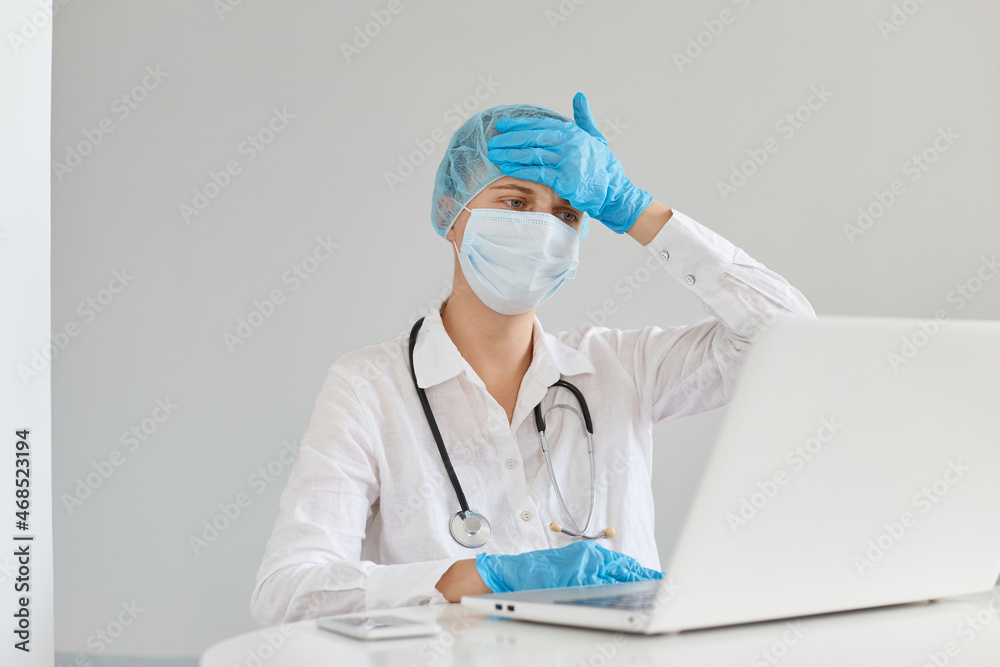 Sick ill woman doctor therapist wearing gown, surgical mask, medical ...
