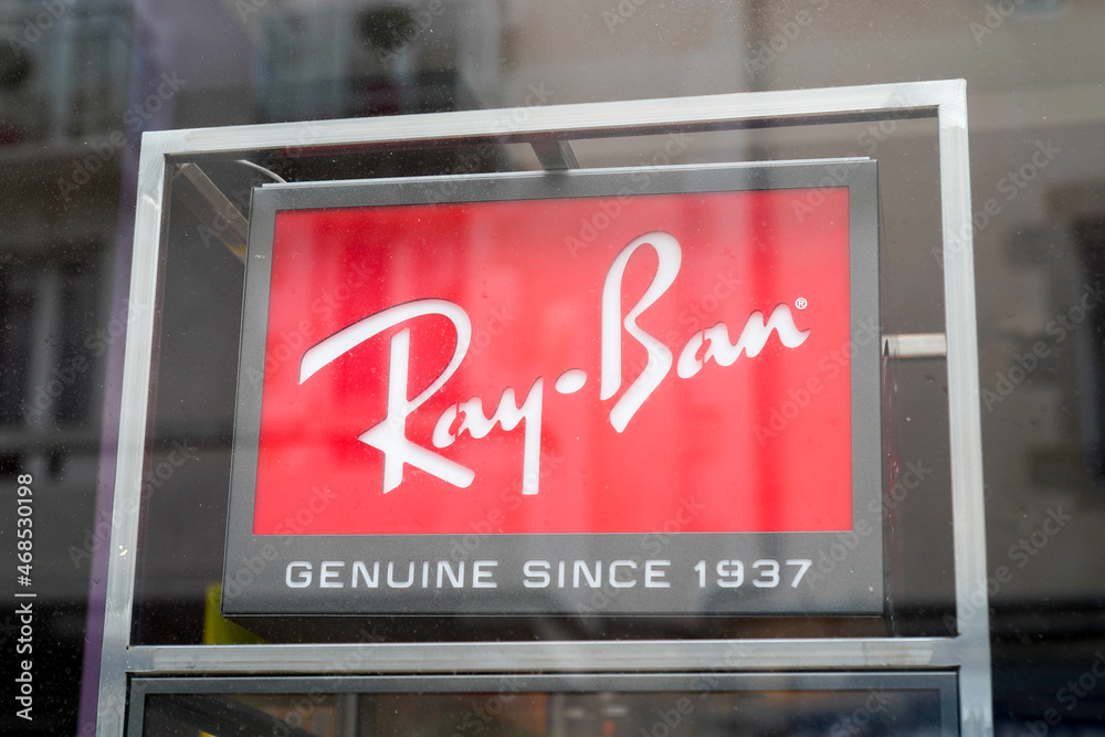 Ray-ban sign logo and text brand front of facade store fashion clothes ...