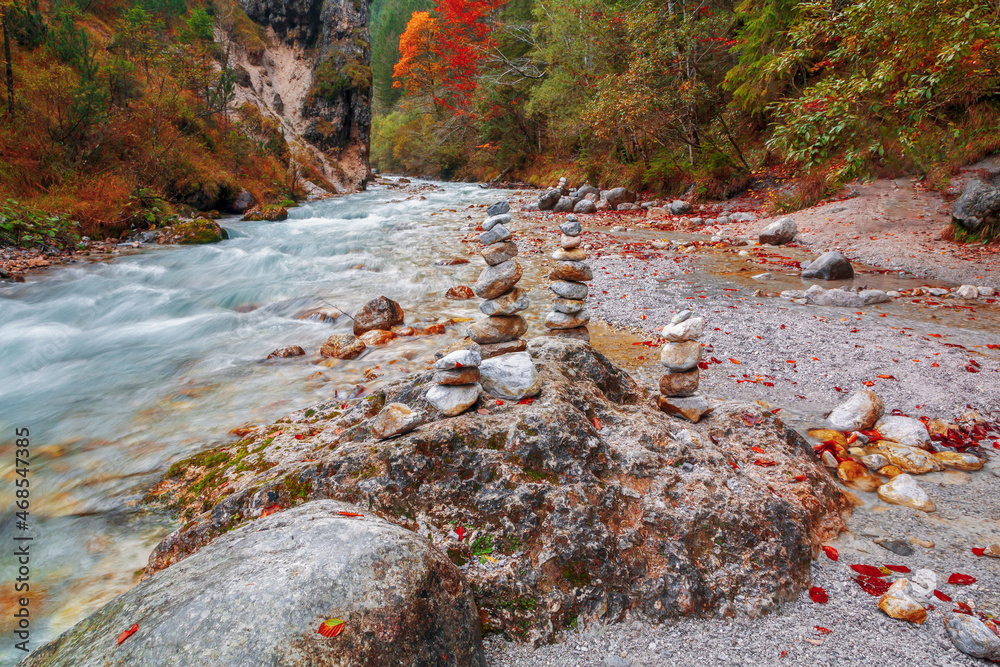 Fast moving river with lots of water in the gorge near the Wimbachklamm ...