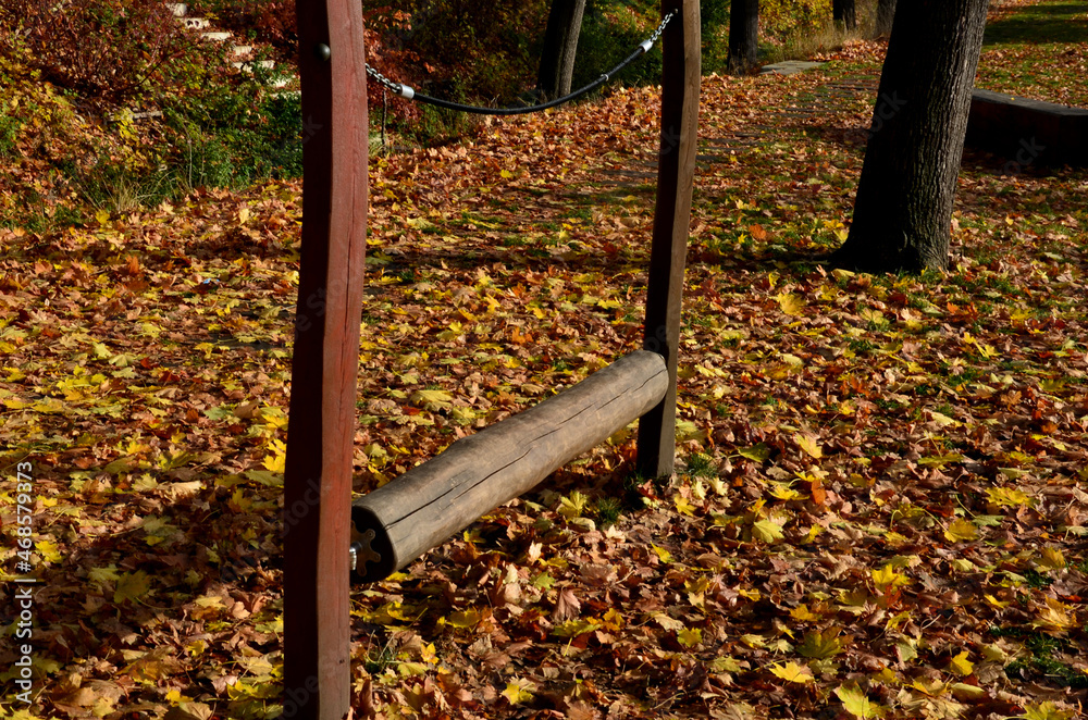 wooden obstacle course, spinning log. the child must cross it and not ...