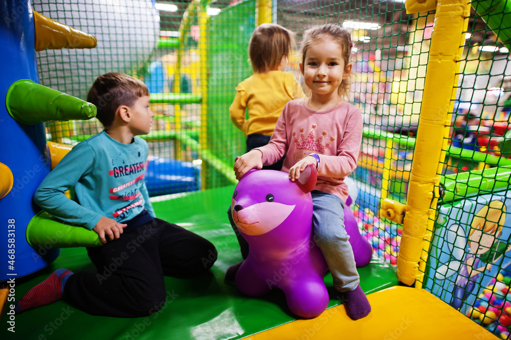 Kids playing in indoor play center. Kindergarten or preschool play room ...