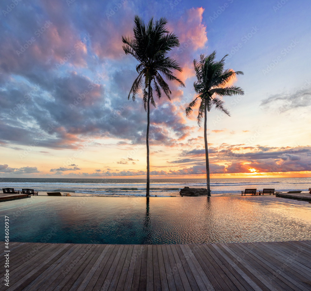 Colorful ocean beach sunrise. Beautiful scenery with calm waves and ...