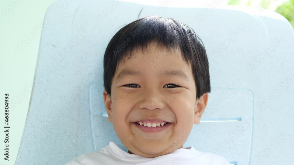 Funny asian cute child boy laughing with closeup happy relax face ...
