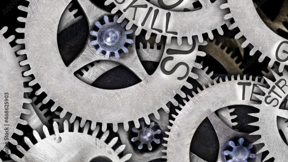 Group of rotating tooth wheels with Success sign imprinted on metal ...