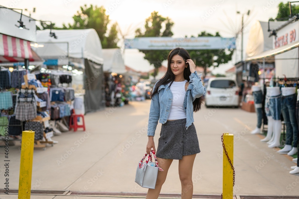 Beautiful asian female young model lady having a solo shopping and ...