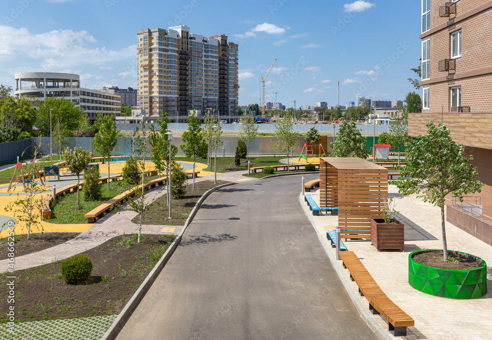 New residential building with playgrounds and green recreation areas ...