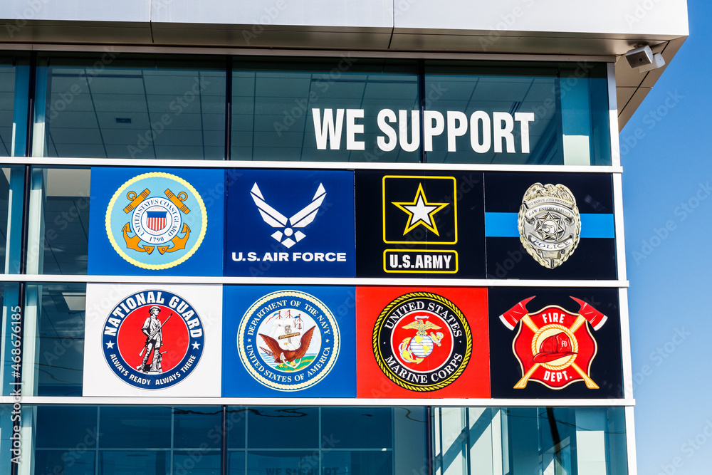 Sign showing support for the US Armed Services including Navy, Army ...