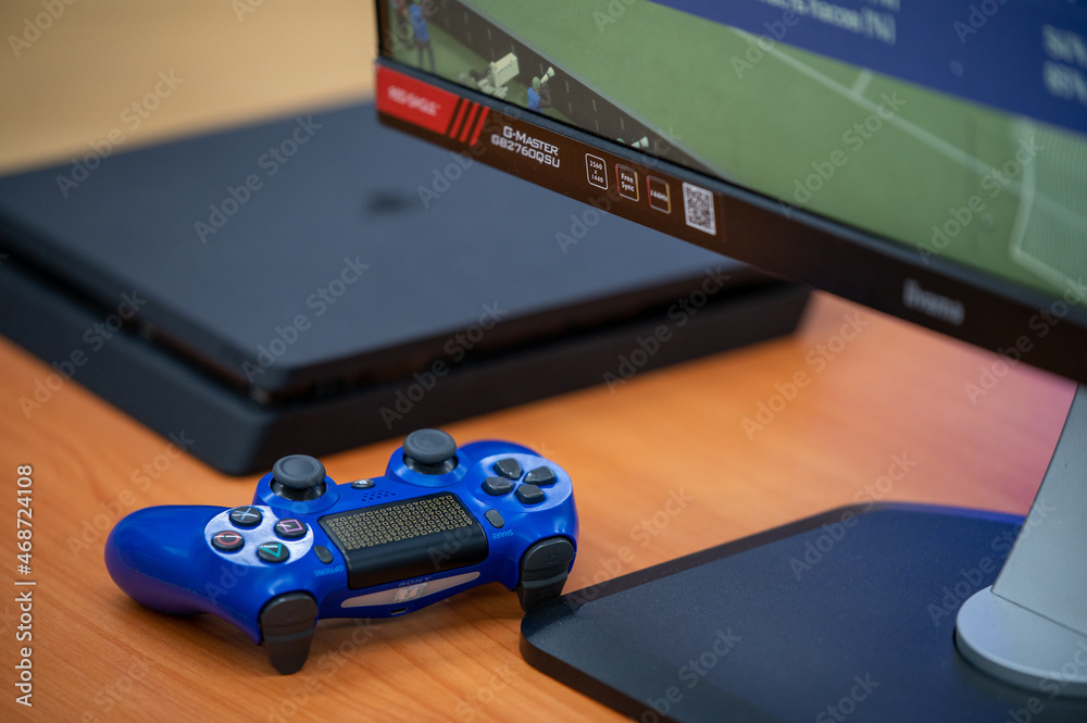 Focus on Hands, Keyboards and Mouse. Back view of young gamer playing ...
