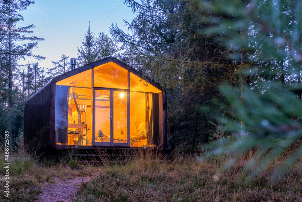 Wooden hut in an autumn forest in the Netherlands, cabin off grid ...