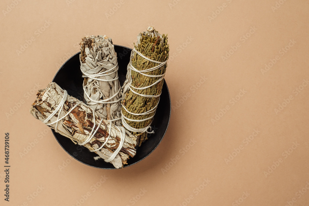Set of incense for fumigation. Branches of white sage with cedar tied ...