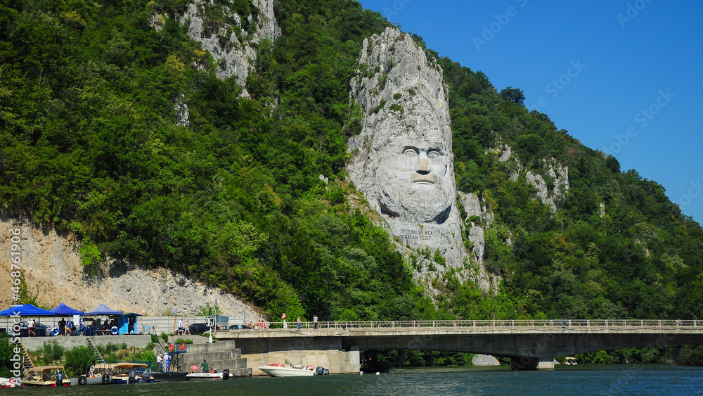 Fotka „The huge stone carved statue showing the portrait of the ancient ...