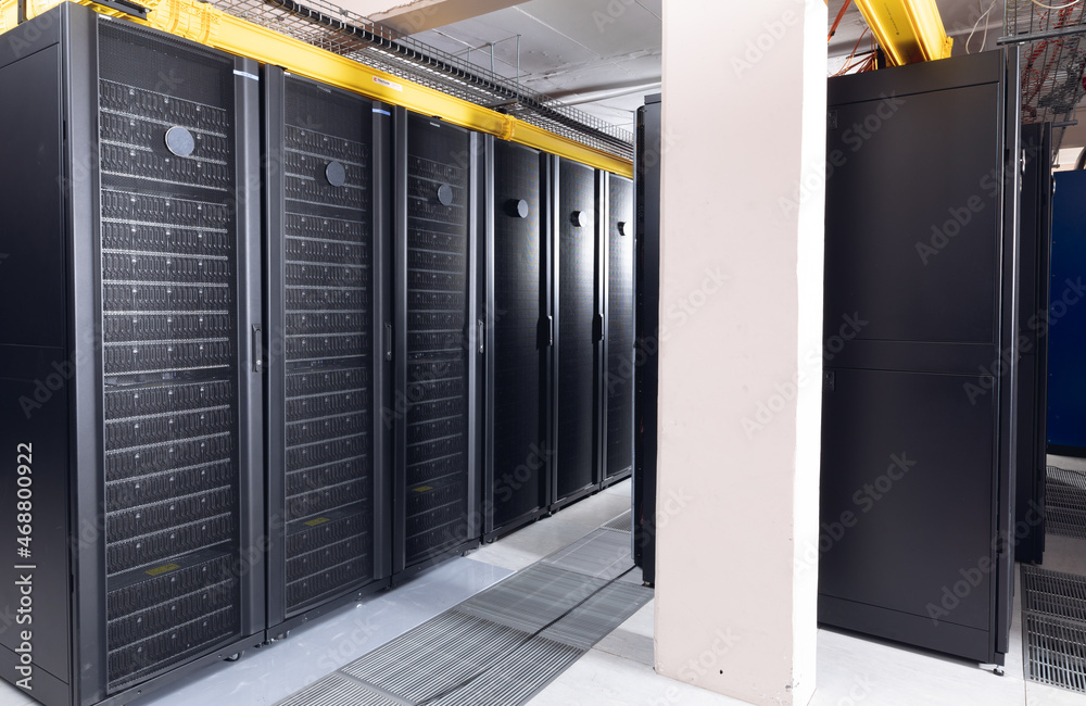 Data center with multiple rows of fully operational server racks Stock ...