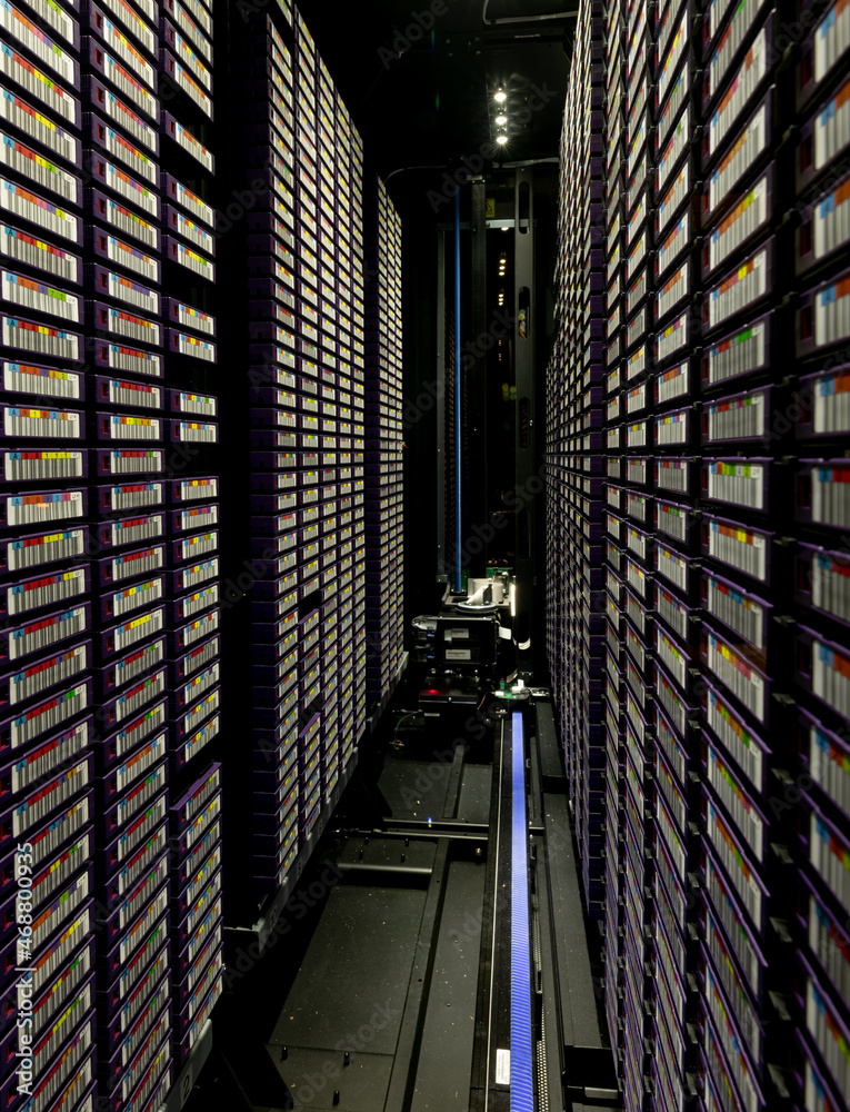 Foto de Data center with multiple rows of fully operational server ...