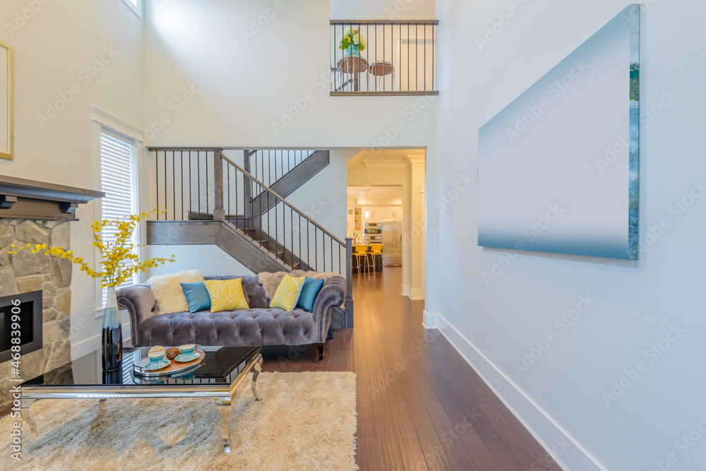 Beautiful and large living room interior with hardwood floors and ...