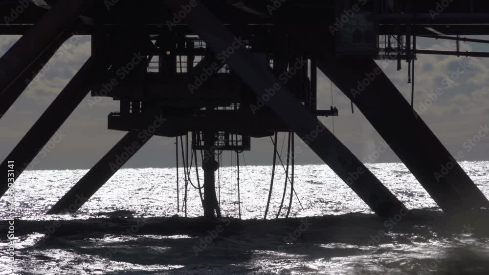 Moonpool of rig. Side view. Silhouette. Bottom of offshore drilling ...