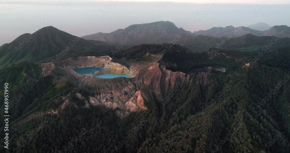 Volcanic mountain lakes in evening dawn. Aerial crater lakes with blue ...