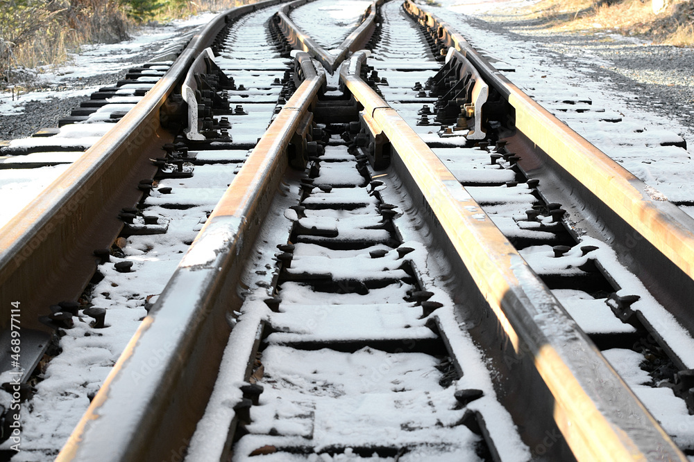 Image of an empty winter railroad track stretching far away. Crossing ...