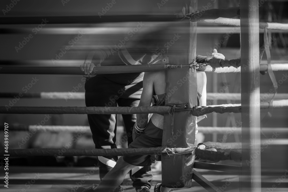 The corner of the boxing ring. The boxer rests between rounds. Retro ...