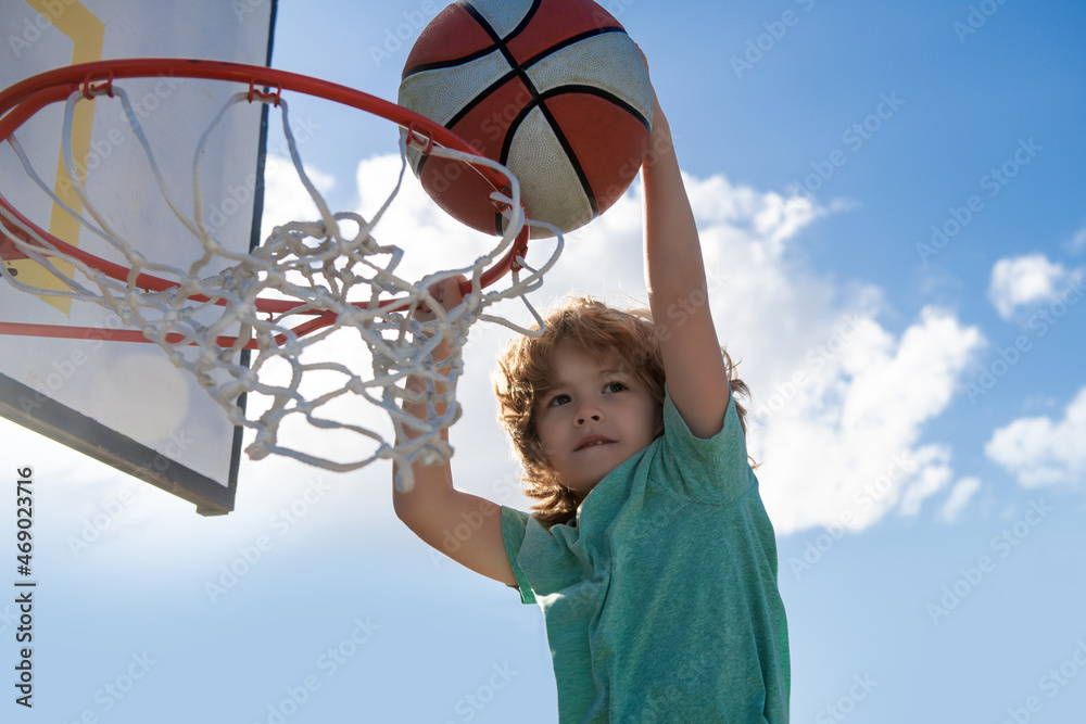 Basketball kid player dunking the ball. Child basketball player making ...