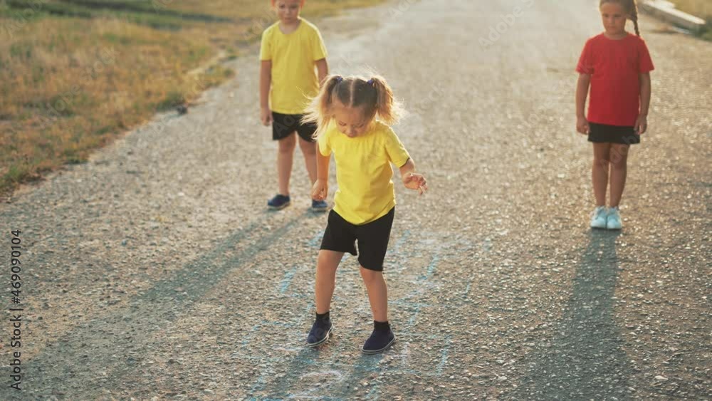 Child on playground play classics. School playground on asphalt ...