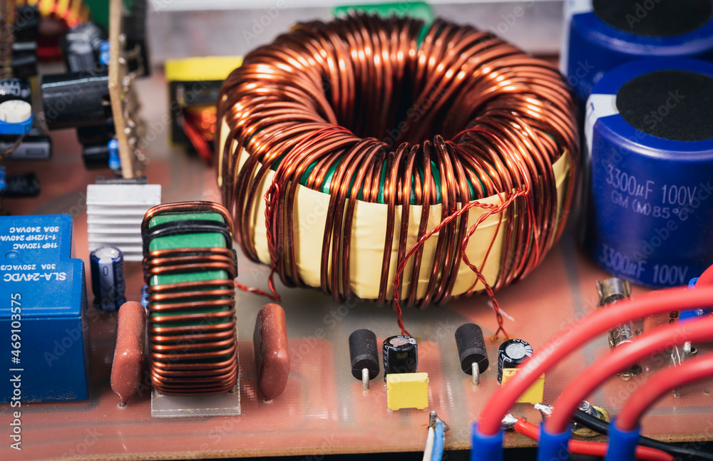 Copper coil on the power supply circuit board. Transformers amplifier ...