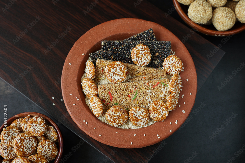 Til chikki peanut chkki Murmura ladoo laddu Revdi popcorn Indian ...