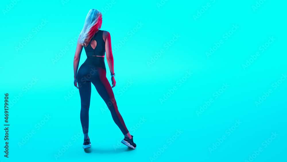 Female bodybuilder. Slim and fit, young and healthy body shape ...