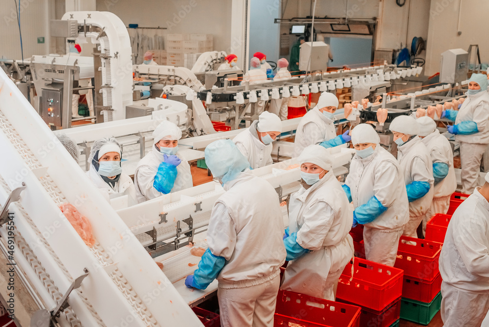People Working In A Food Factory