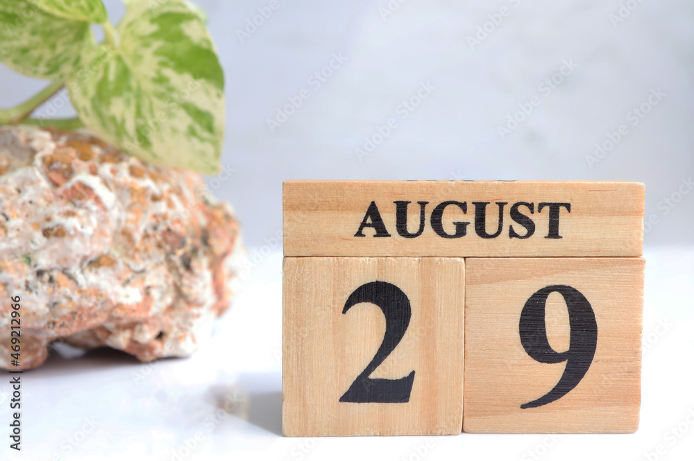 Hello August, Cube wooden calendar showing date on 29 August. Wooden ...