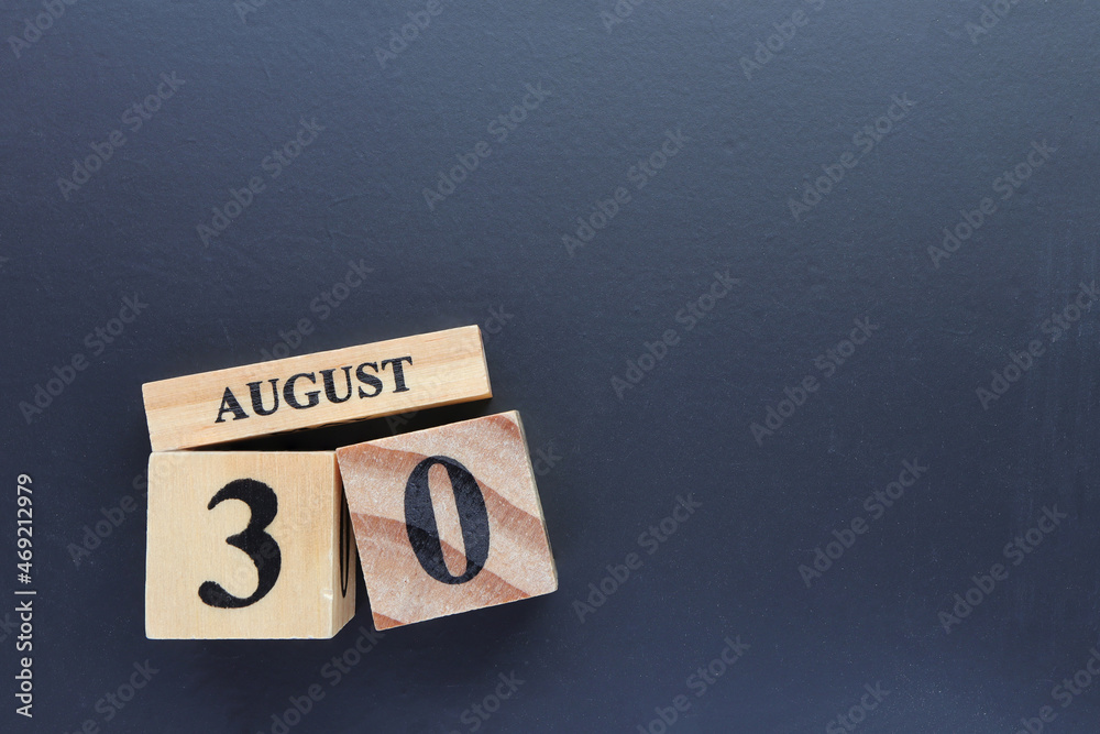 Hello August, Cube wooden calendar showing date on 30 August. Wooden ...
