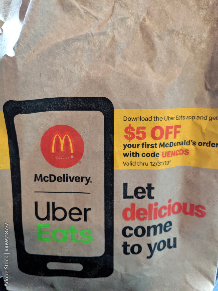 Paper Bag of McDonald's food with MCDelivery Uber Eats Ad printed on ...