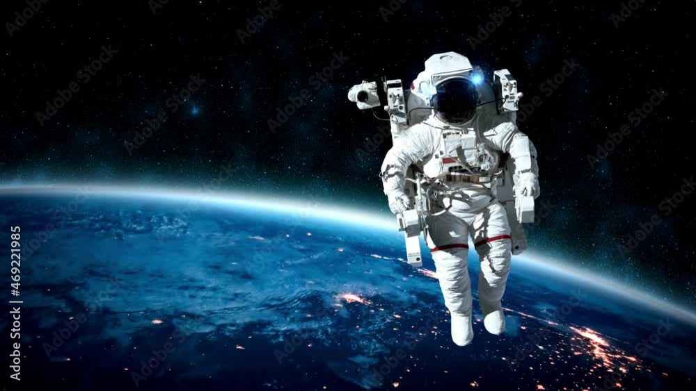 Video Stock Astronaut spaceman do spacewalk while working for ...