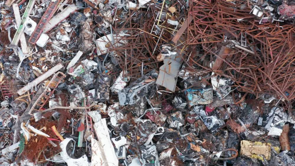 Scrap metal at a junkyard (wrecking yard) ready to be recycled ...