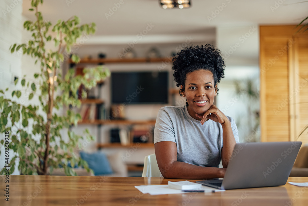 African-american woman, completing her application Stock Photo | Adobe ...