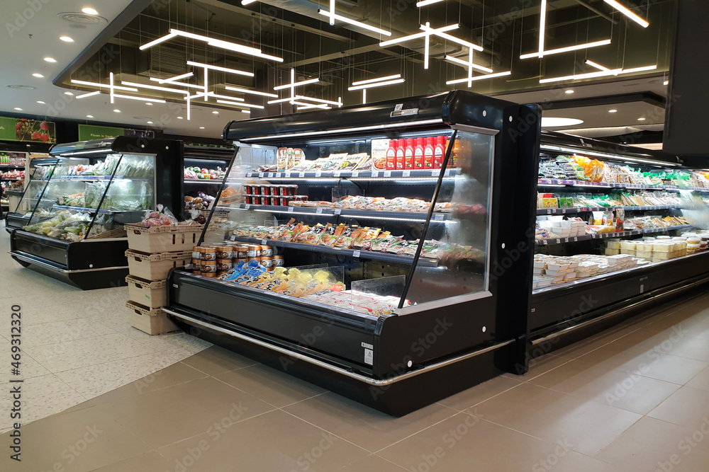 Fresh food, fruits and vegetables display on refrigerator shelves in ...