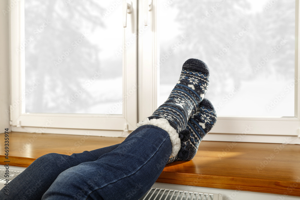 Woman legs with winter window and free space for your decoration. Stock ...