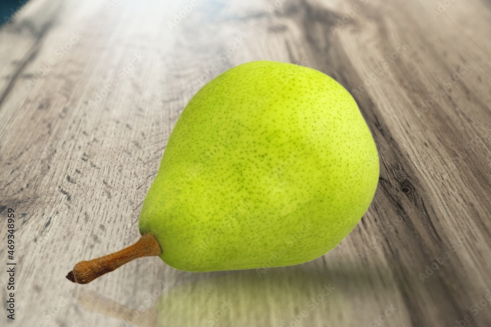 Pear on a blue background as a female body shape. A metaphor of sex ...