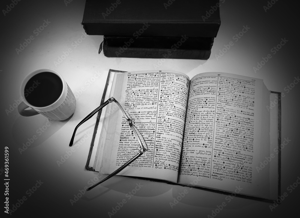 Black and White Beautiful Book reading concept with Glasses and Coffee ...
