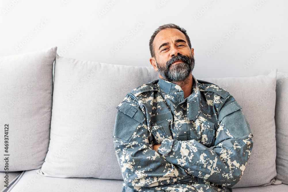 Portrait of a handsome man in his United States military uniform ...