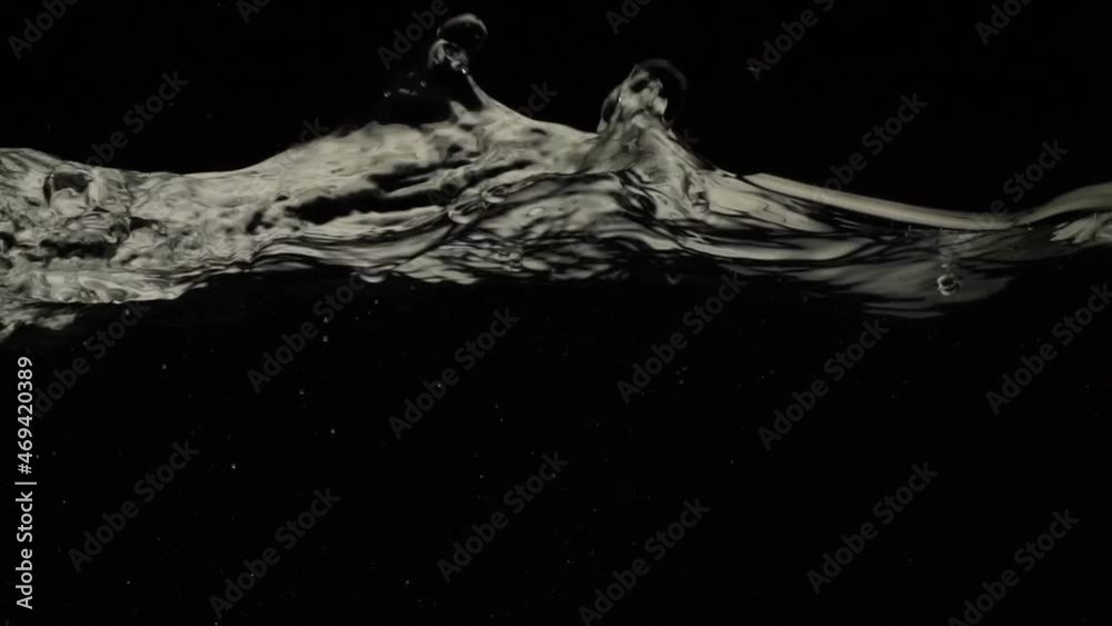 Liquid water shaking wave surface in water tank Stock Video | Adobe Stock