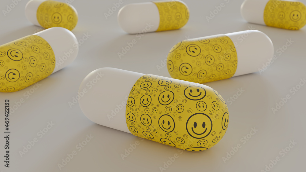 Smiling face textured medicine tablets lying on flat surface ...