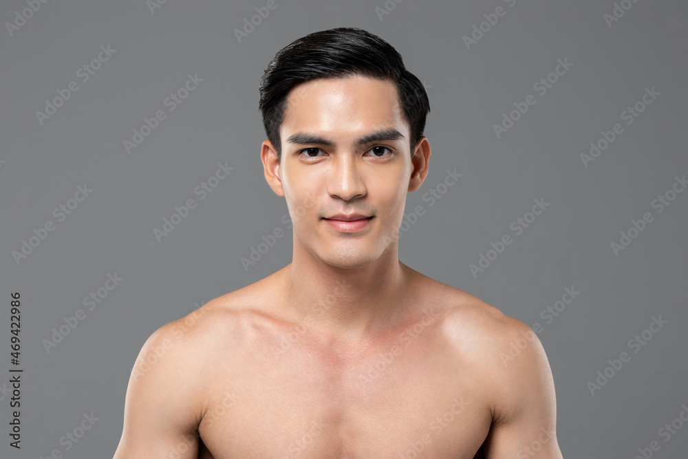 Beauty portrait of shirtless handsome Asian male model smiling on ...