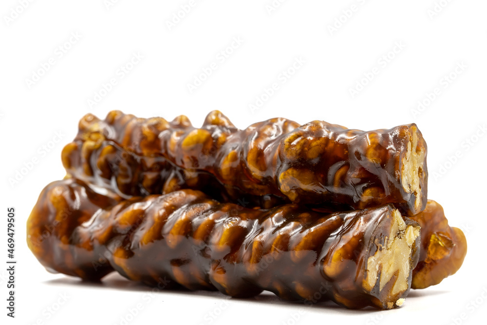 Sausage walnuts on a white background. Turkish walnut raisin sausage ...