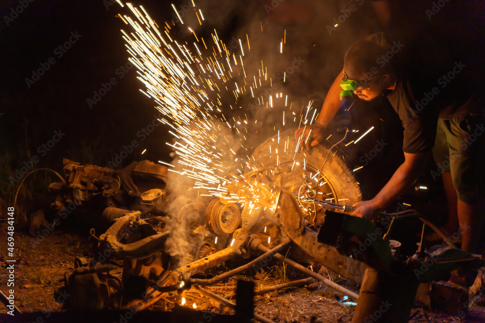 Foreign workers cut steel at construction sites with Oxy-Propane ...